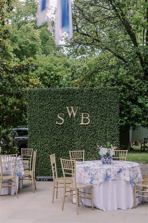 Boxwood Hedge Wall White Door Events