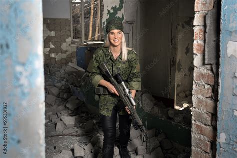 Girl Sniper With A Smile On Her Face With A Sniper Rifle In Her Hand In