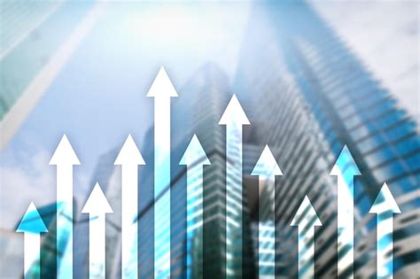 마천루 배경 투자 및 금융 성장 개념에 위쪽 화살표 그래프 프리미엄 사진