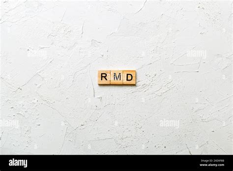 Rmd Word Written On Wood Block Required Minimum Distributions Text On Table Concept Stock