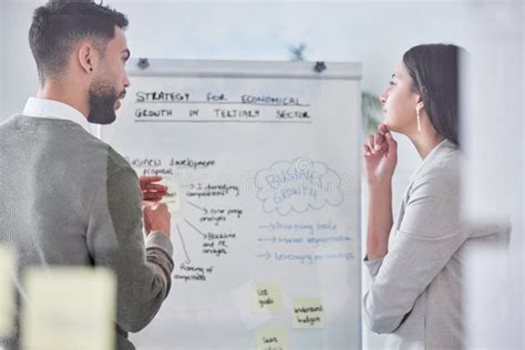 Two Minds Is Better Than One Two Business People Brainstorming Ideas
