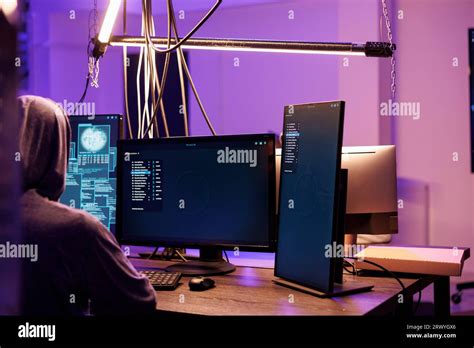 Hacker Running Malicious Software On Screen For Cracking Password Malware Code Displaying On
