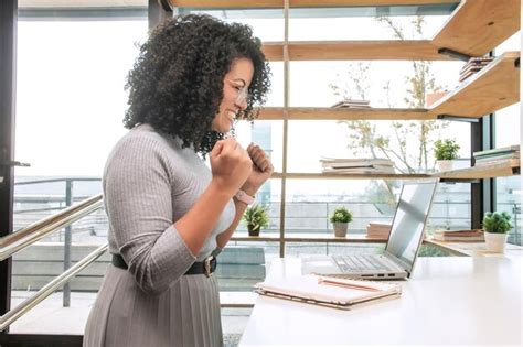 Premium Photo Latina College Student Girl With Afro Hair Excited In
