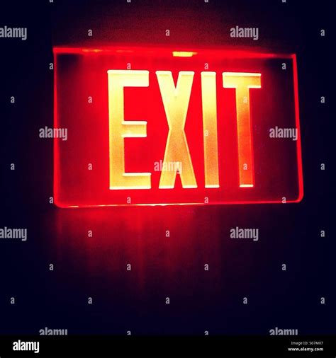 Red Exit Glowing Sign Stock Photo Alamy