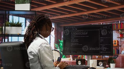 Programmer Types Code Into Pc Entering Commands Running Script African American It