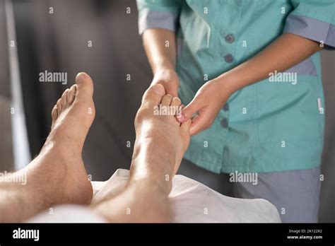 Man Having Foot Massage In Medical Office Close Up Photo Of A Spa