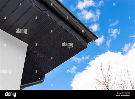 Round Wireless Camera Mounted On The Corner Of The Roof In The Soffit Monitoring Of A Single