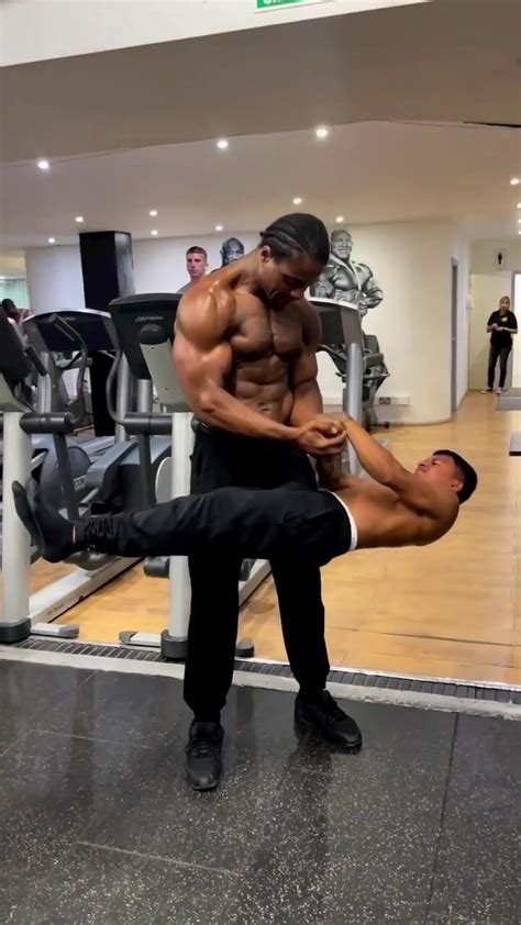 Big Bodybuilder Uses His Tiny Friend To Worout