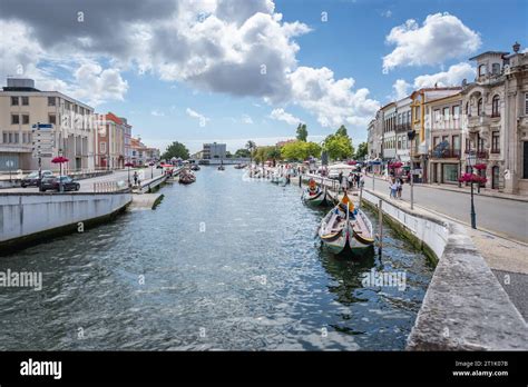 Water Canal And Moliceiros Boats In Old Town Of Aveiro City In Portugal