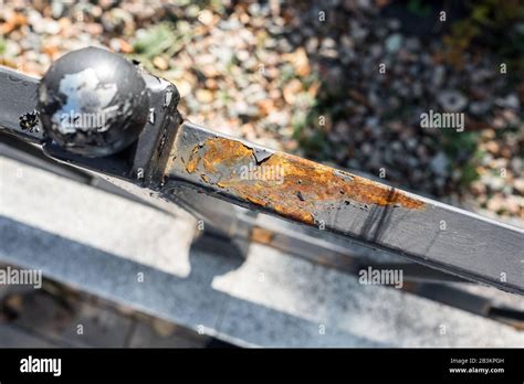 Rust On A Beautiful Black Fence Cracks In The Paint Orange Rust Spots