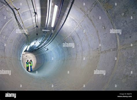 Engineers Inspect Access Adit To Main Power Cable Tunnel In London