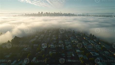 San Francisco Skyline Emerging From Morning Fog Over Houses 55216704