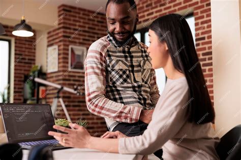 Free Photo Programmers Couple Developing Encryption Code On Laptop Using Terminal Window With