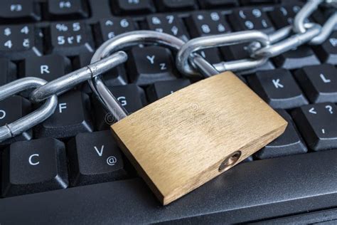 Lock With Chain On Computer Keyboard Data Protection Privacy And Security Concept Stock Image