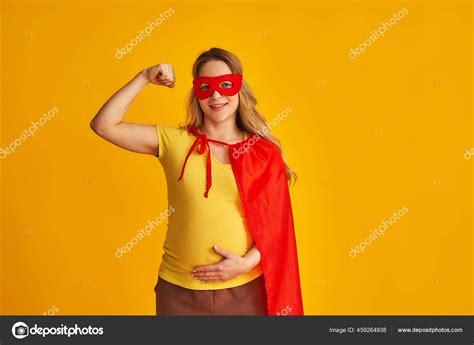 Attractive Smiling Pregnant Woman Superhero Costume Wearing Red Mask