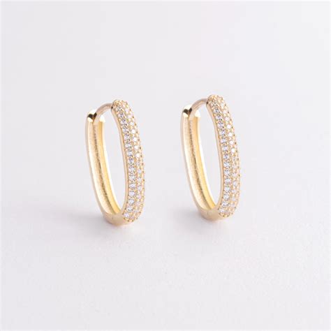 Золоті сережки Овальні з фіанітами с09502 купити Золоті сережки Овальні з фіанітами с09502