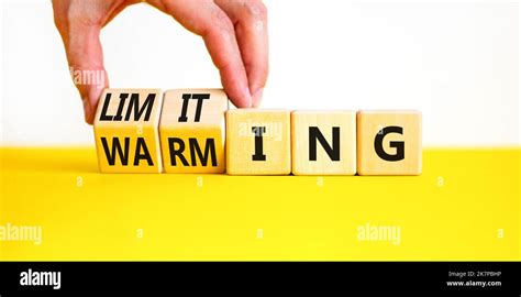 Limiting Global Warming Symbol Concept Words Limiting And Warming On Wooden Cubes Businessman