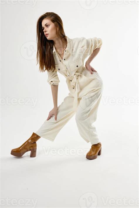 Pretty Woman In Full Length Jumpsuit Light Background Model 22253522