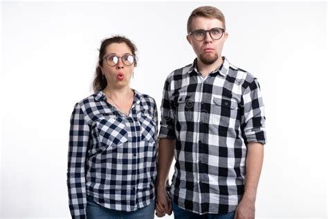 Nerds Geek Bespectacled And Funny People Concept A Couple Of Nerds In Glasses Show Us Thumbs