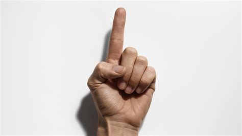 Picture Of Hand Showing Their Index Fingure On White Background Generative Ai Premium Ai