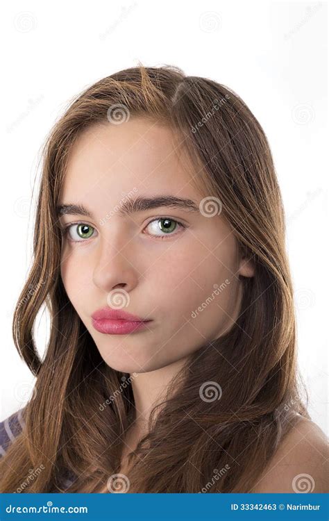 Closeup Portrait Of A Teenage Girl Kissing Lips Isolated On Whit Stock