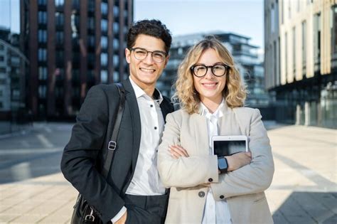 Premium Photo Portrait Of A Young Team Of Programmers Or Financiers With Glasses Business Meeting