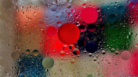 Colorful Water Drops On Glass Wallpaper