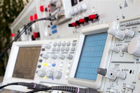 Analog And Digital Oscilloscope In The Foreground Stock Photo Image Of Control Signal