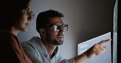 hispanic latin american couple software engineer developer use computer