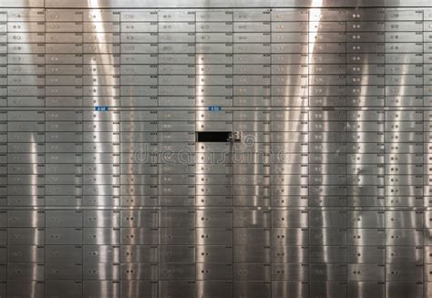 Safe Deposit Boxes Inside Bank Vault With Closed Steel Doors Metal