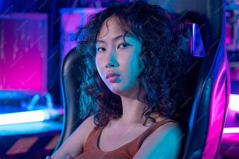 Premium Photo An Asian Woman Programmer Is Working In Her Computer