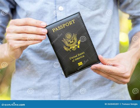Anonymous Unrecognizable Man Holding A Usa Passport United States Of