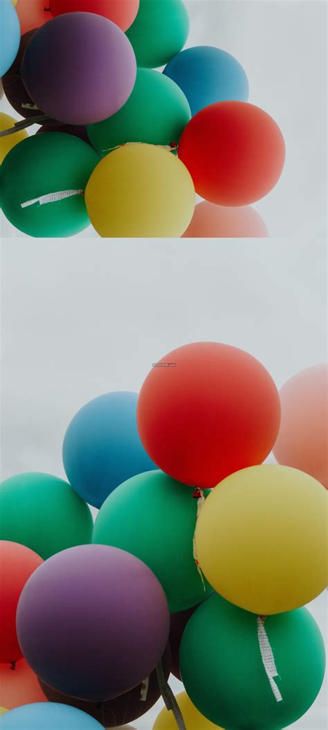 不同颜色的气球飞向空中浪漫节日