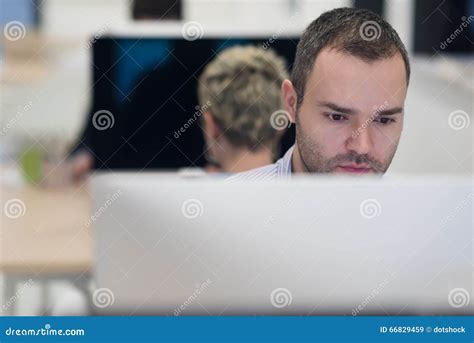 Startup Business Software Developer Working On Desktop Computer Stock