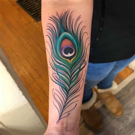 31 Beautiful And Luxurious Peacock Feather Tattoo Designs For You