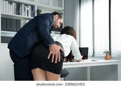 Caucasian Businessman Erotic Touch Asian Businesswoman Stock Photo 2300621453 Shutterstock