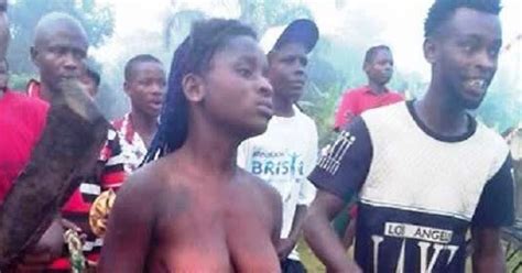 Despicable A Lady Is Been Stripped Naked For Stealing Chicken See