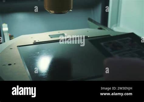 Laboratory Assistant Places The Chip In An X Ray Scanner To Detect Defects X Ray Technology And