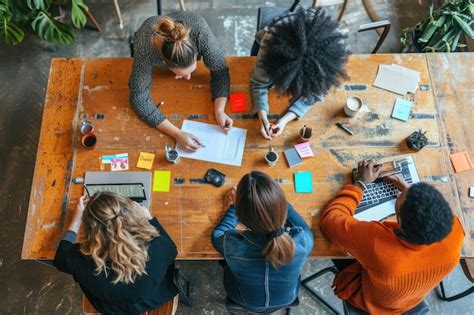 Premium Photo Office Teamwork During A Brainstorming Session Collaborative Synergy In An