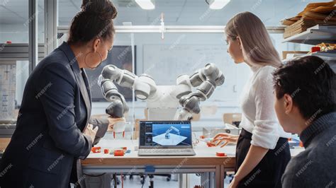 Premium Photo Black Professor Analyse And Discuss Futuristic Robotic Arm With Two Diverse