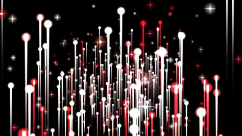 Abstract Animation Of Glowing Gold Particles With Rays Loopable