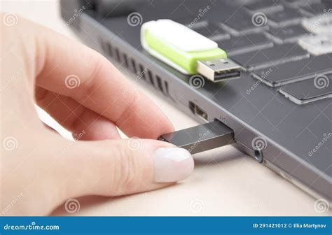 USB Memory Stick Or Flash Drive On The Keyboard Of An Open Laptop Stock Photo Image Of Modern