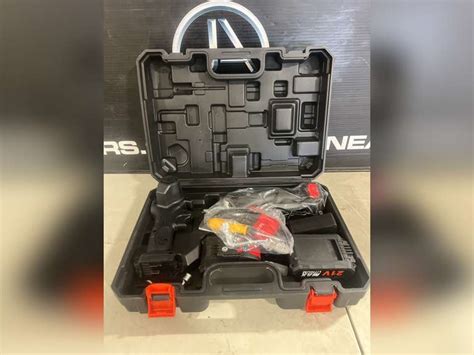 Cordless Prunerchainsaw Set Jardine Auctioneers