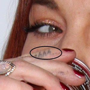 Lindsay Lohans 11 Tattoos And Their Meanings Body Art Guru