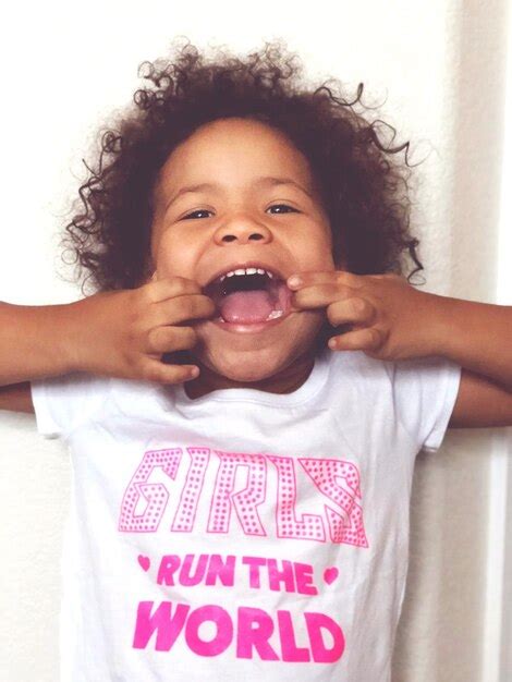 Premium Photo Portrait Of Cute Girl With Open Mouth At Home