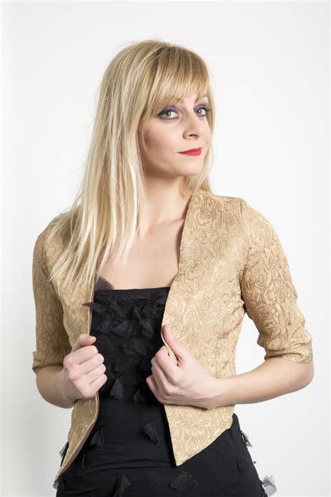 Attractive Fashion Indoor Portrait Of Beautiful Blonde Girl Posing In