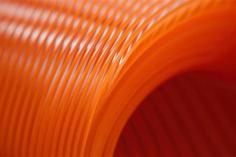 Premium Photo Capturing The Intricate Patterns And Textures Of A Ribbed Plastic Binding