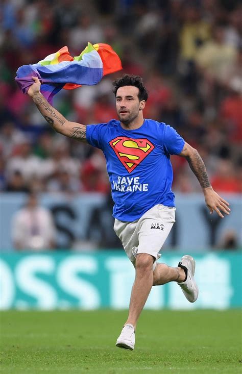 Protester Carrying Lgbtq Flag Interrupts Game At The 2022 World Cup