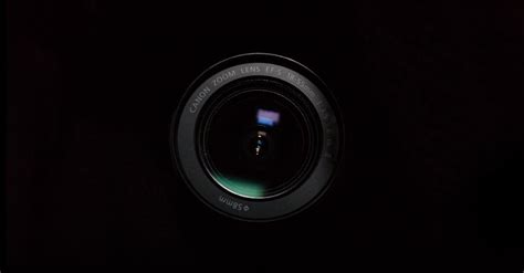 검은색 배경의 Dslr 카메라 렌즈 클로즈업 · 무료 스톡 사진