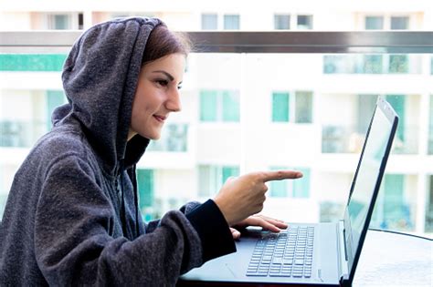 Woman Hacker Programmer Is Working On Computer In Cyber Security Center
